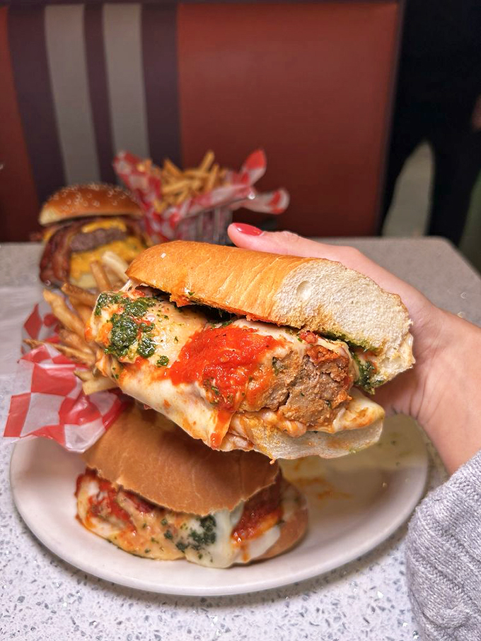 This isn't just a sandwich&mdash;it's a meatball masterpiece that requires both hands, several napkins, and absolutely no shame.