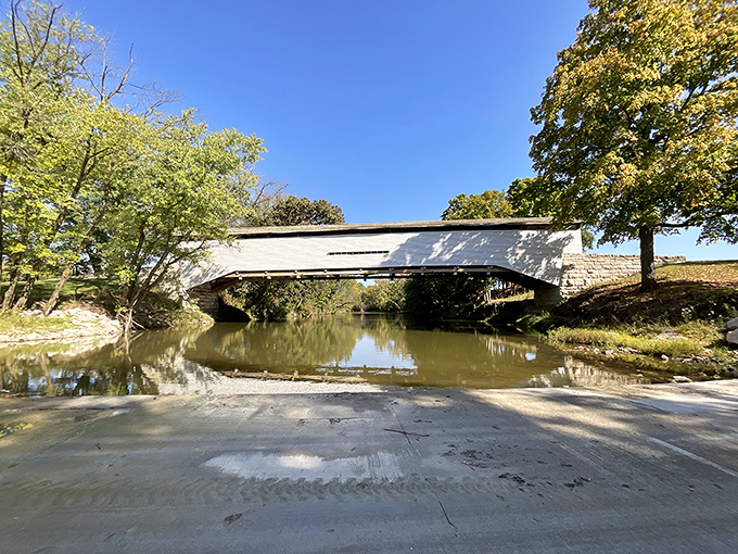 The bridge's reflection doubles the beauty&mdash;nature's own Instagram filter working its magic on the tranquil waters below.