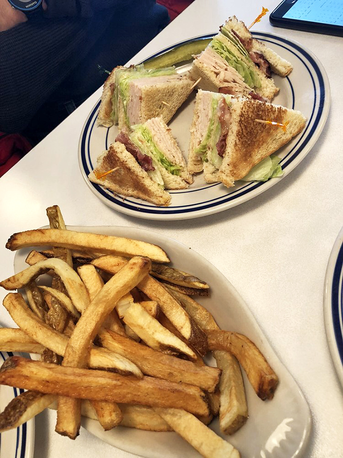 The classic club sandwich &ndash; architecture you can eat, with layers of goodness held together by those little wooden spears of sandwich solidarity.