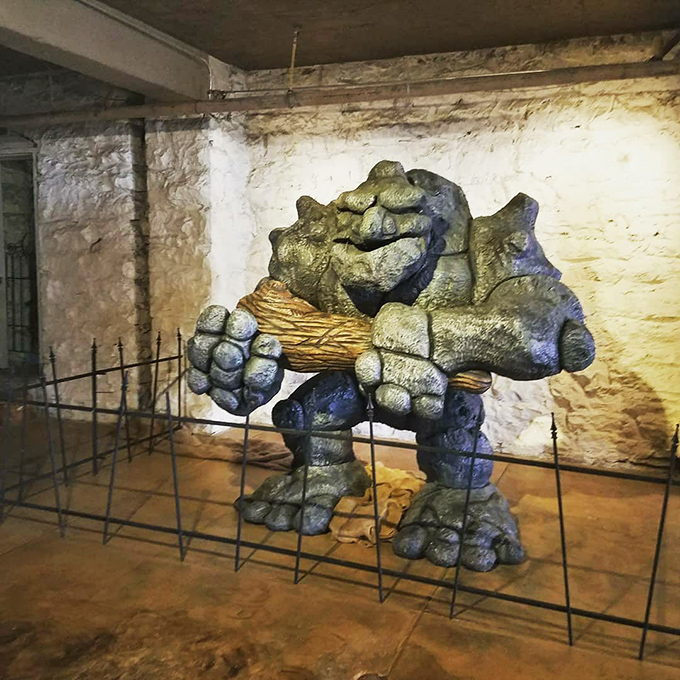 This basement troll sculpture looks like he's waiting for billy goats to cross his bridge&mdash;or perhaps just wondering why humans keep taking his picture.
