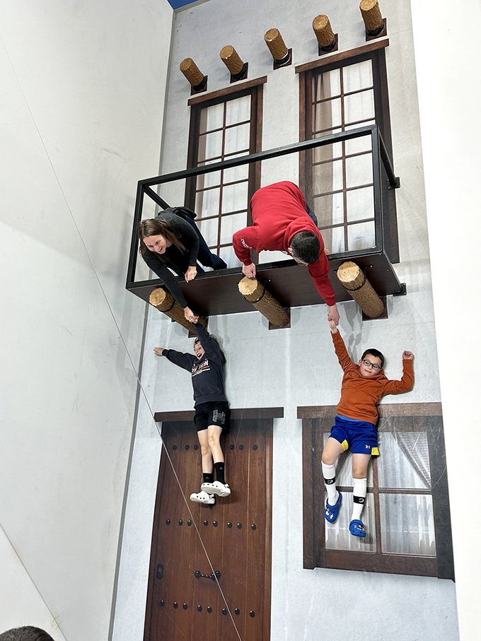 "Help! We're defying gravity!" This upside-down room creates the perfect illusion of visitors performing superhuman feats of strength and balance.