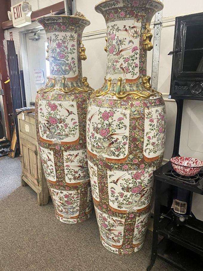 These ornate vases stand tall like floral skyscrapers from another era. Imagine explaining to your spouse why you need matching six-foot porcelain masterpieces in your living room. 