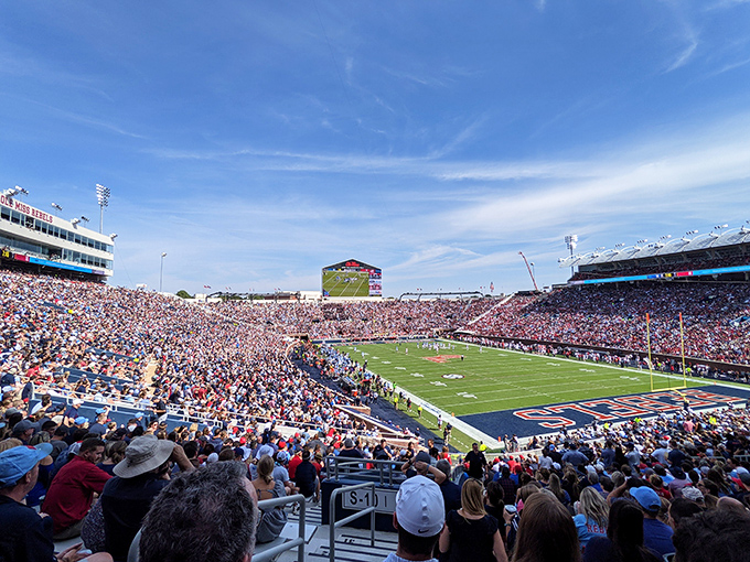 On game day, Vaught-Hemingway Stadium transforms into Mississippi's third-largest city, a sea of red and blue passion under the Southern sky.