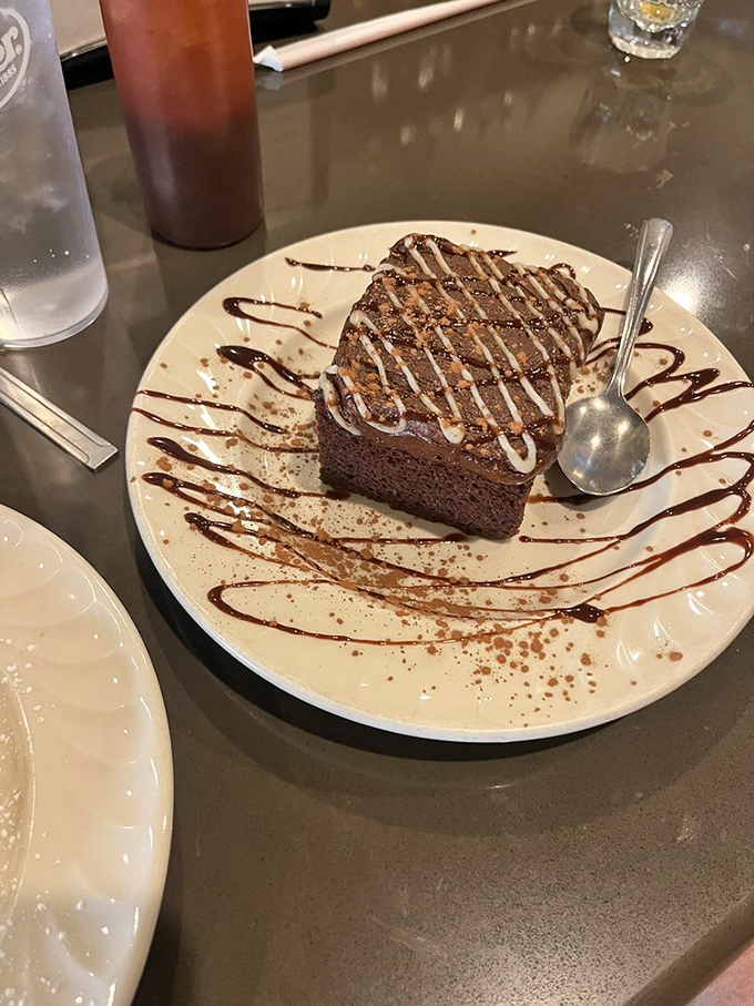 Chocolate cake that's somehow vegan yet decadently rich. Those sauce drizzles aren't just decoration&mdash;they're edible calligraphy.