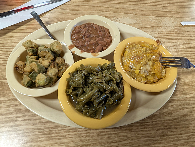 The vegetable plate that proves Southerners know their way around produce. Fried okra, collard greens, mac and cheese, and beans&mdash;a quartet of comfort.
