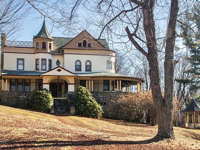 This grand Victorian beauty stands like a dowager duchess surveying her domain, porch ready for rocking chair philosophers.