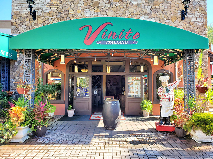 Vinito Italiano offers a civilized respite from shopping chaos, complete with a chef statue who won't judge your purchases.