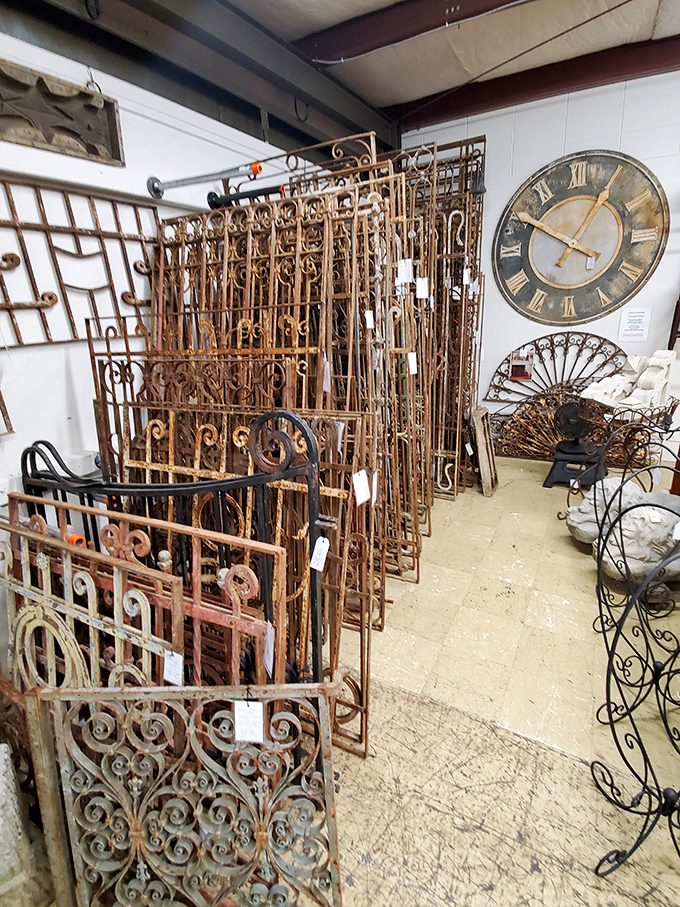 Rusty gates and iron scrollwork lean against history. These architectural salvage pieces are waiting for their second act.