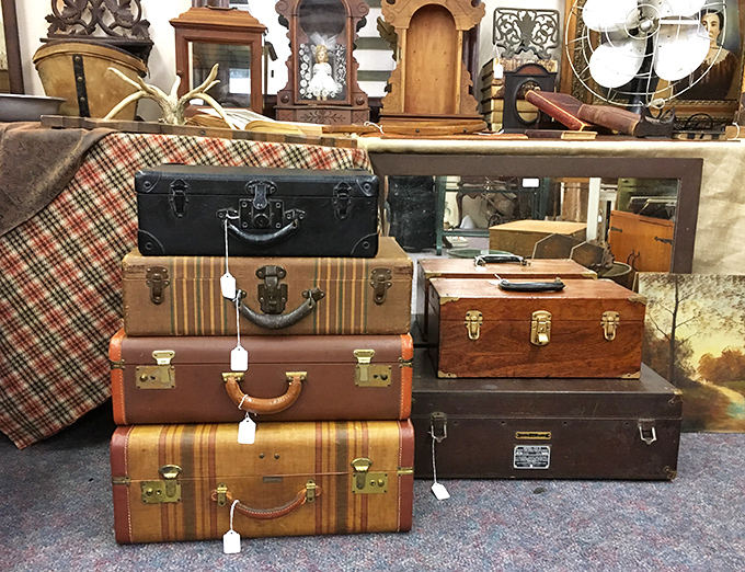 Vintage luggage from when travel meant adventure, not removing your shoes at security.