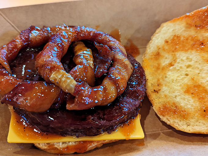 A burger that makes other burgers question their life choices. Those caramelized onions aren't just toppings—they're flavor crowns for beef royalty.