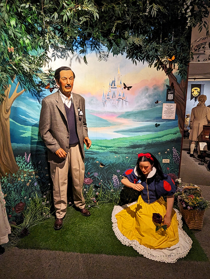 Walt Disney and Snow White share a magical moment, though she seems understandably concerned about accepting apples from strangers.