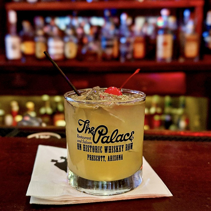 When a cocktail glass proudly displays "The Palace" name, you know you're sipping history&mdash;their whiskey sours are as legendary as the saloon itself.