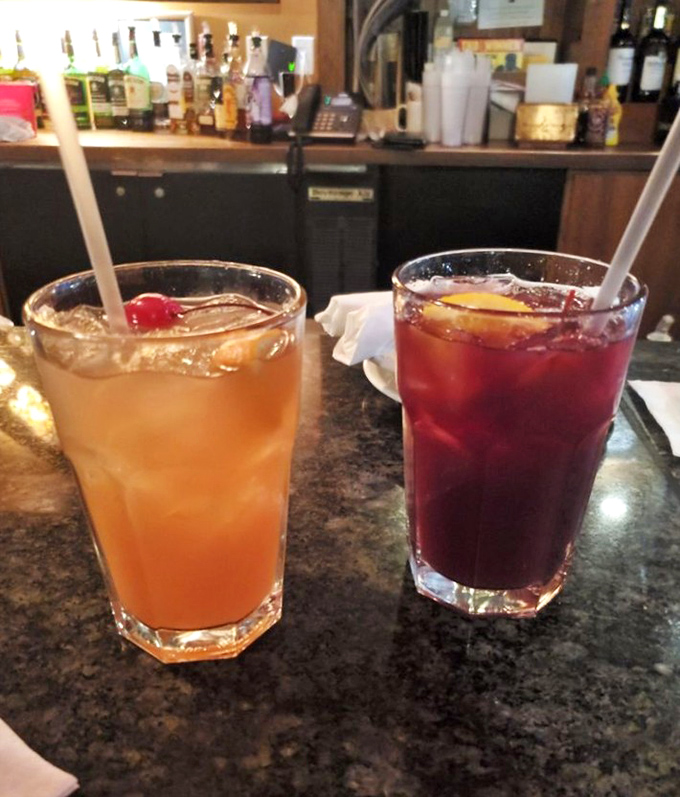 Sangria two ways&mdash;one sunset orange, one berry red&mdash;both promising a sweet escape from whatever Monday threw your way.