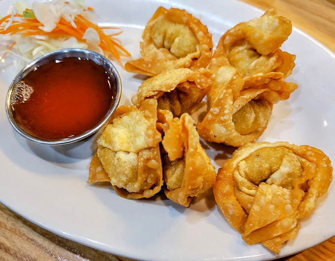 Crab rangoon &ndash; those little fried dumplings that somehow make cream cheese seem like an authentic Asian ingredient. Deliciously deceptive little morsels!