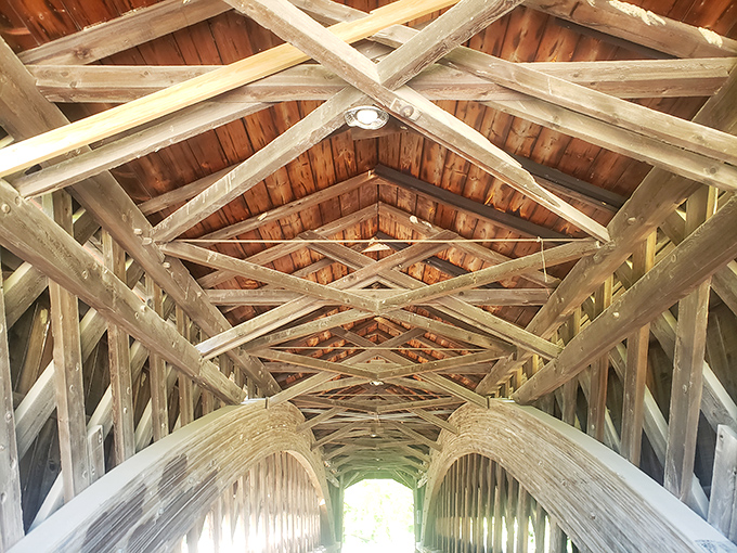 The ceiling's crisscrossing beams create a hypnotic pattern. Stand here long enough and you might decode the secrets of the universe.