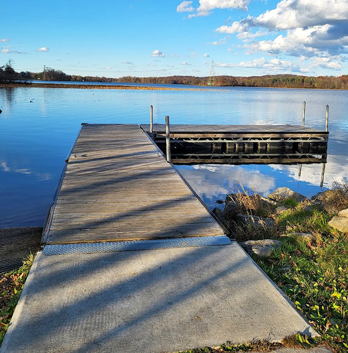 Mirror, mirror on the lake. This wooden dock offers the perfect platform for contemplating life or practicing your fishing tall tales.