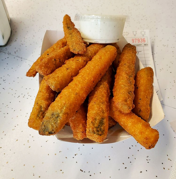 Golden zucchini sticks that prove vegetables can be just as indulgent as any burger creation.