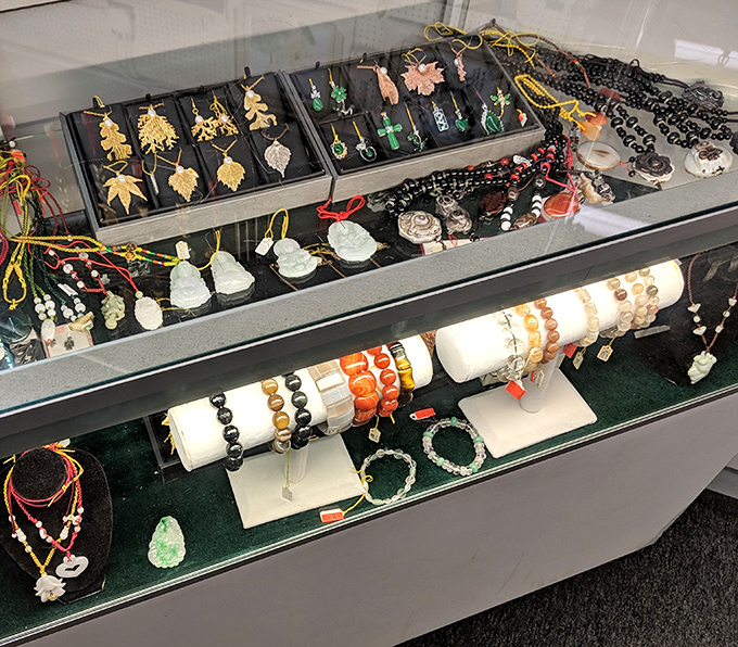 Jade pendants and beaded bracelets sparkle under the lights, offering affordable elegance for every taste and style.