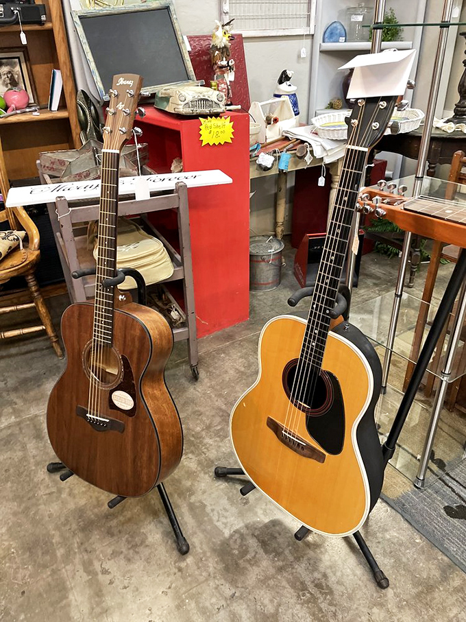 Acoustic guitars waiting for their next musician&mdash;each instrument carrying the potential for countless songs and stories.