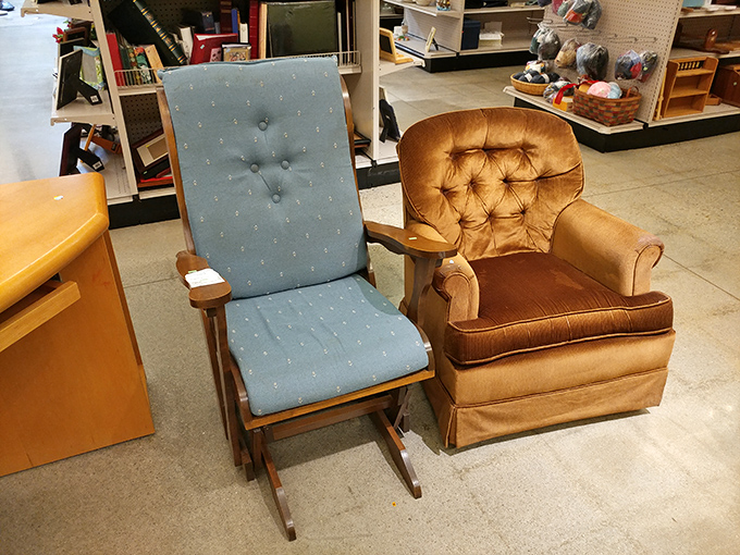 The chair showdown: Mid-century rocker meets 1980s recliner. One says "sophisticated design lover," the other says "Sunday football in supreme comfort."