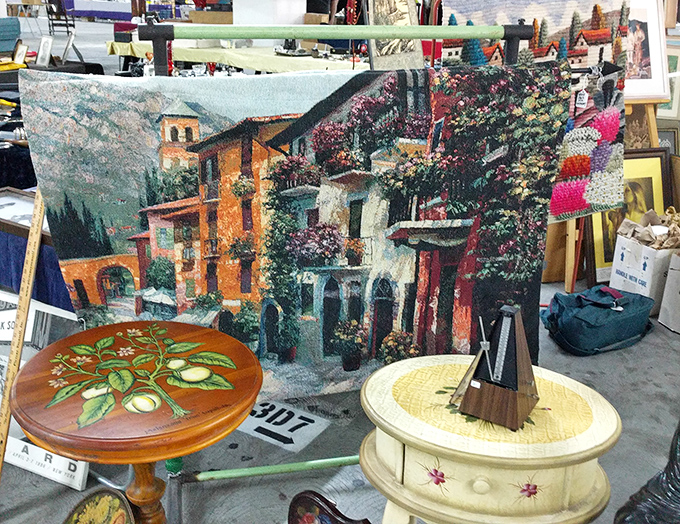 Someone's discarded painting becomes another's living room masterpiece&mdash;that Mediterranean village scene just waiting for its forever wall.