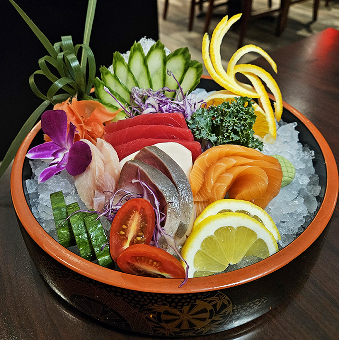 A sashimi presentation so beautiful it feels almost criminal to disturb it – nature's candy arranged with artistic precision.