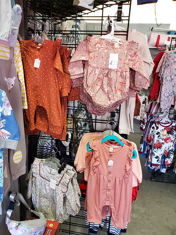 Tiny fashion statements hang in perfect rows. These baby clothes aren't just adorable&mdash;they're future first birthday photo opportunities waiting to happen.
