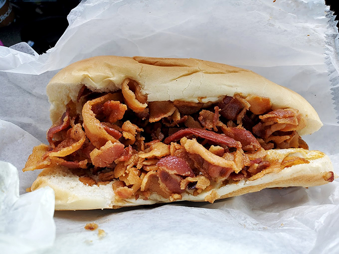 A bacon sandwich so generously filled it could make vegetarians reconsider their life choices, if only for one glorious moment.