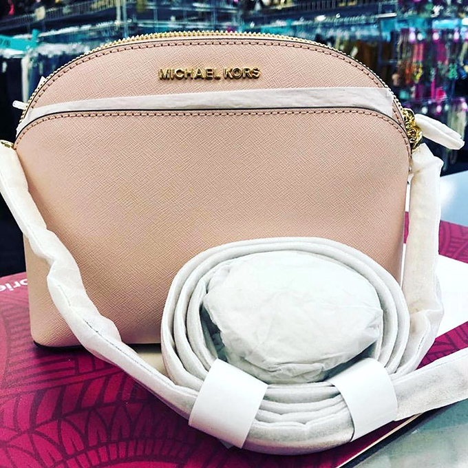 A Michael Kors bag that looks barely touched &ndash; the fashion equivalent of finding an unopened vintage wine at a yard sale.