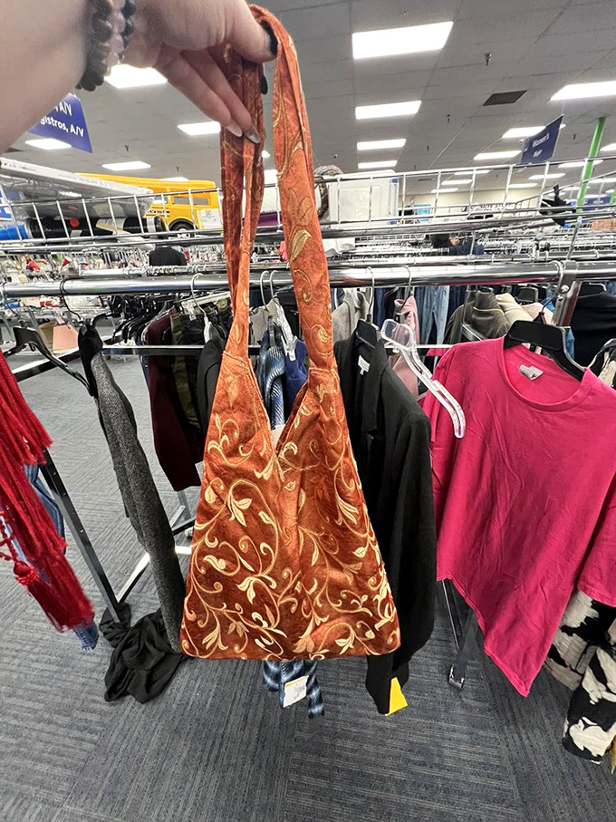 Embroidered elegance hanging among everyday items. This ornate bag once accompanied someone to special occasions&mdash;now it's your turn to continue its story.