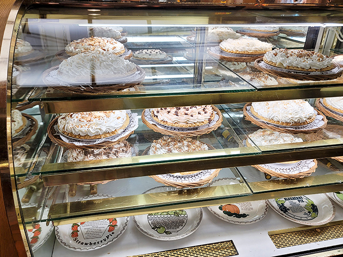 The pie case at Buttercup Pantry isn't just a display—it's a museum of edible art where meringue reaches for the heavens.