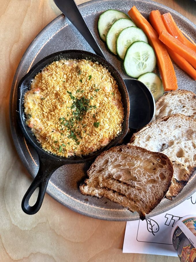 Bubbling hot dip that makes vegetables and bread mere vehicles for cheesy, seafood goodness. Resistance is futile, seconds are inevitable.