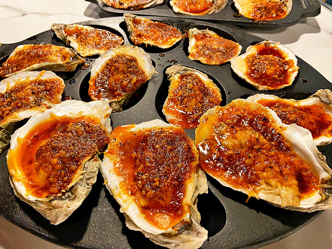These baked oysters, bubbling with savory toppings, are what happens when the ocean meets fire in a beautiful culinary romance.
