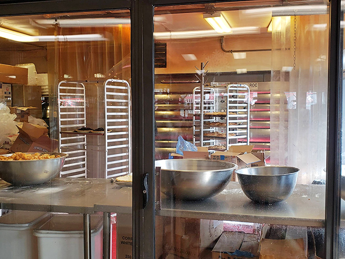 A glimpse behind the magic curtain. Those baking racks aren't just equipment&mdash;they're the launching pads for dreams made of butter and flour.