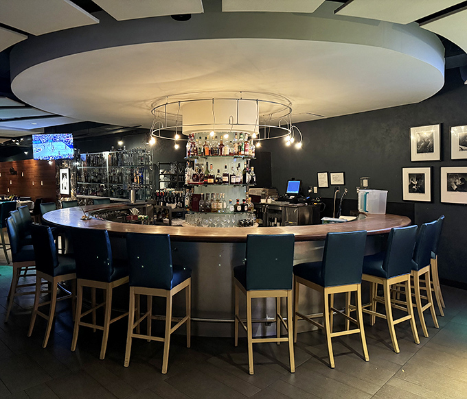 The circular bar isn't just where drinks are served&mdash;it's where strangers become friends and "just one more" becomes the evening's mantra.