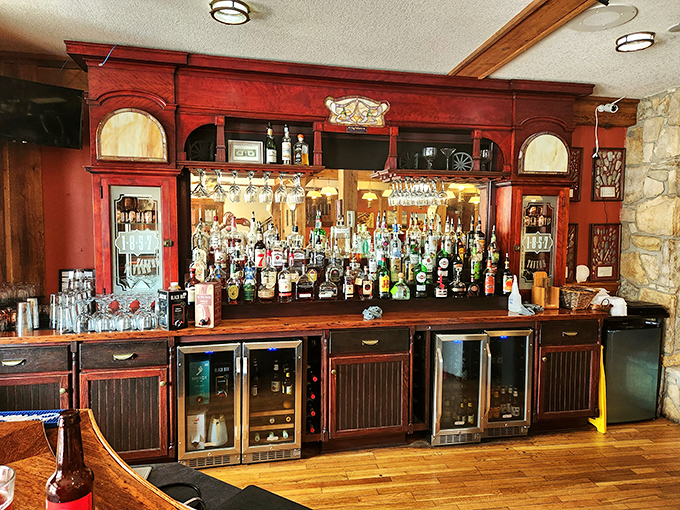 The tavern's rich wooden bar doesn't just serve drinks&mdash;it serves stories, with every polished inch reflecting over a century of toasts and tales.