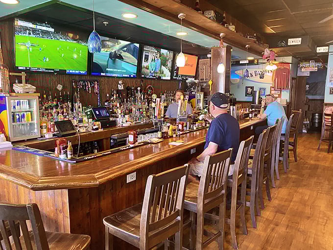 The bar at Woody's isn't just serving drinks; it's hosting a community gathering where strangers become friends over Orange Crushes.