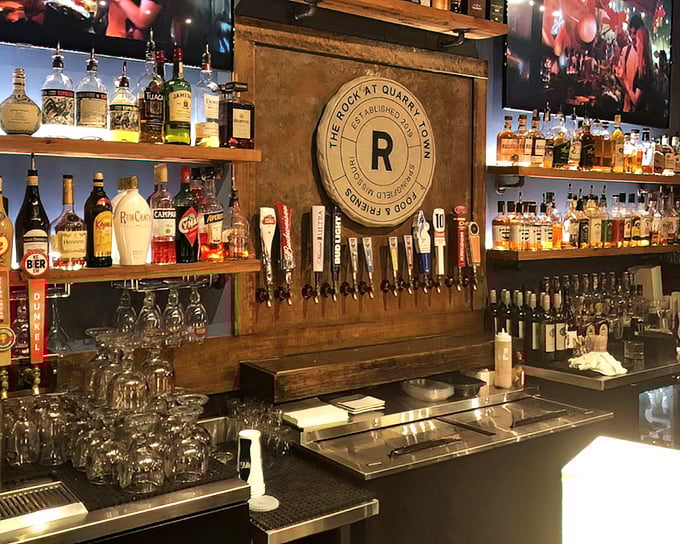 The bar at The Rock doesn't just serve drinks&mdash;it showcases them like the liquid treasures they are, all wood, warmth, and welcome.