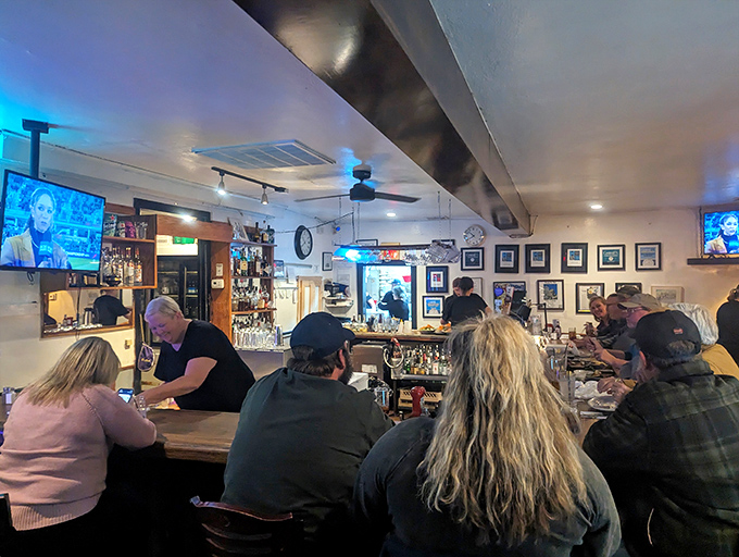 The bar area&mdash;where strangers become friends, friends become regulars, and regulars become part of the extended Glass Lounge family.