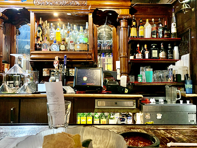 The bar doesn't just serve drinks; it serves possibilities &ndash; each bottle a story waiting to be poured into your evening's narrative.