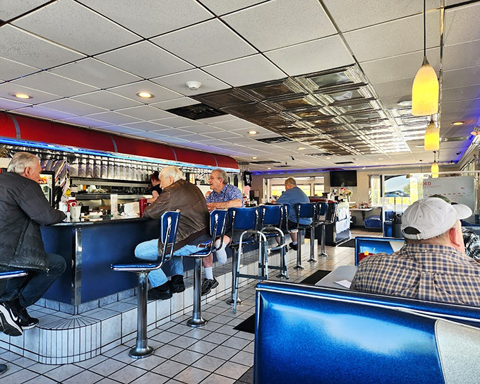 Counter seating: where solo diners become regulars, coffee refills are automatic, and the world's problems get solved daily.