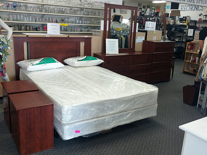 Bedroom furniture that's ready for its second act. That mattress might be new, but the headboard has stories it will never tell.