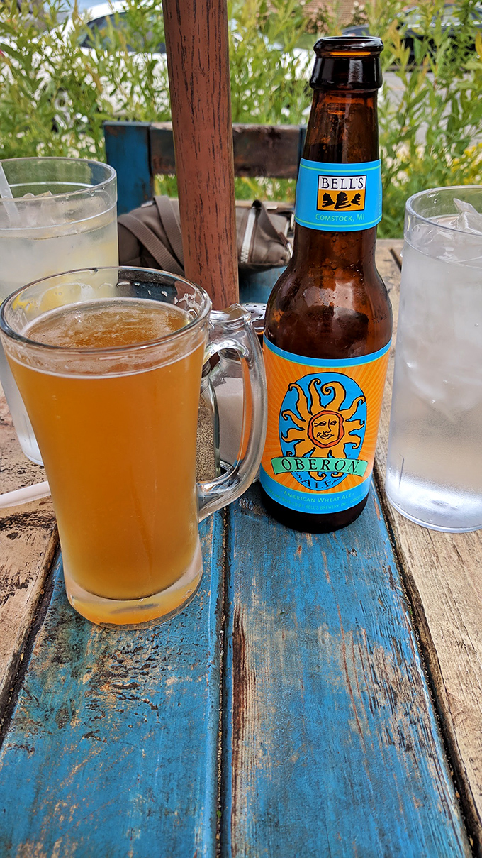 Bell's Oberon—Michigan's liquid sunshine in a glass—perfectly paired with river views and the anticipation of seafood delights to come.