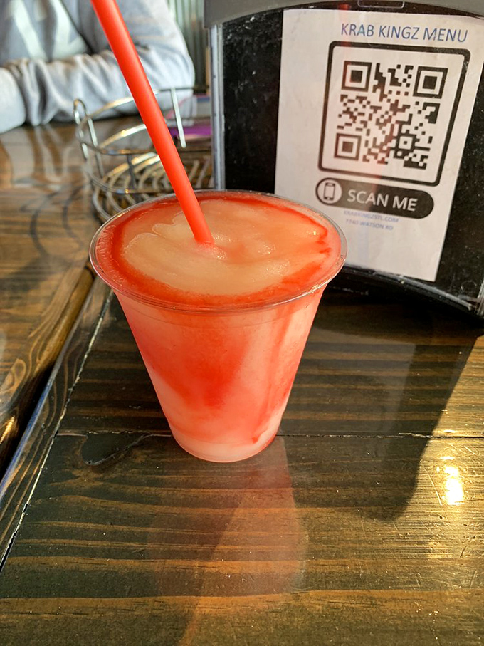 A frosty strawberry concoction that whispers "vacation" with every sip. The perfect palate cleanser between butter-drenched bites of seafood magnificence.