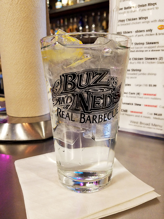 Even the water glass gets branded here, because commitment to excellence extends right down to your beverage choice and presentation.