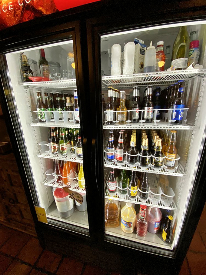 The beverage cooler stands ready like a United Nations of refreshment &ndash; Mexican sodas diplomatically sharing space with American favorites.