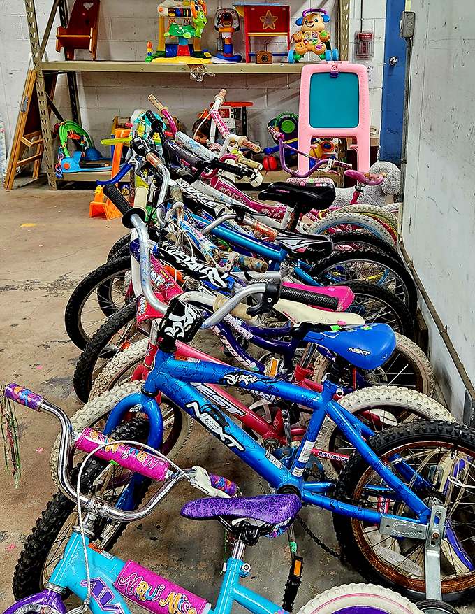 Bicycle heaven for kids and nostalgic adults alike. That pink handlebar tasseled beauty is waiting to make some child's summer magical.