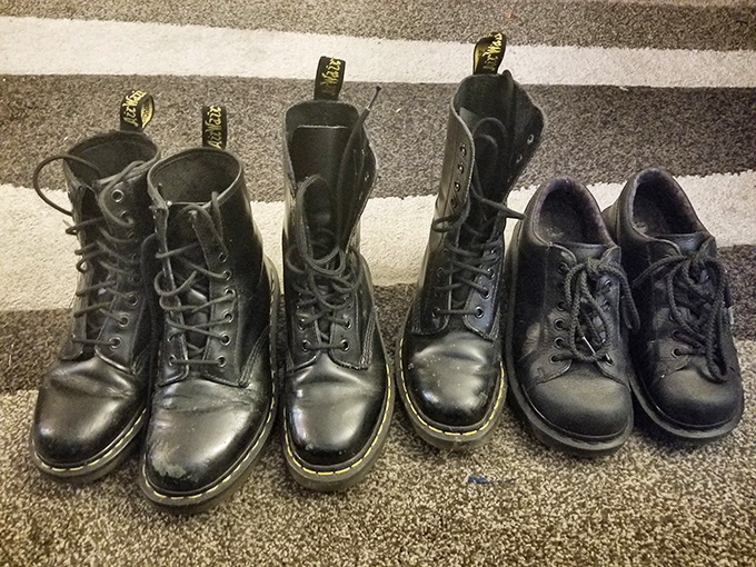Doc Martens lined up like soldiers of style, each scuff telling stories of concerts, protests, or just really good walks.
