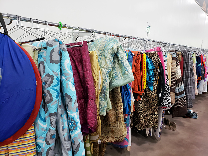 A rainbow of fabrics hanging in perfect harmony&mdash;each garment patiently waiting for its "where have you been all my life?" moment.