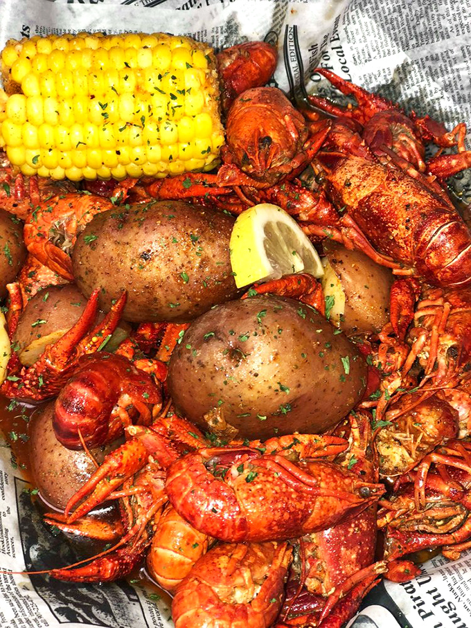 A newspaper-lined feast of bright red crawfish, potatoes, and corn on the cob&mdash;messy eating that's worth every napkin.